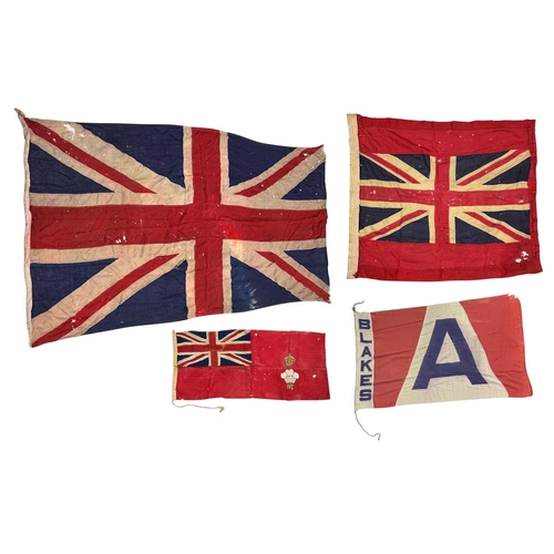 Two sewn Union Jack flags, early 20th century, 125cm by 250cm and 110cm ...