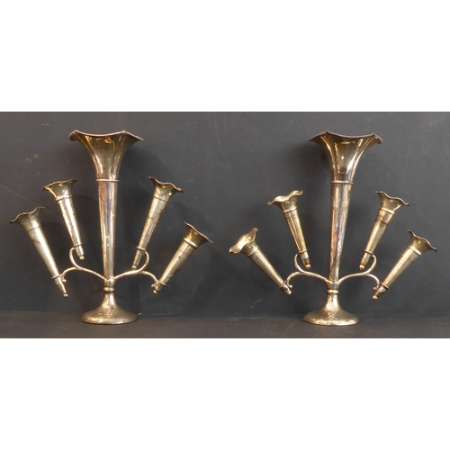 A pair of five-trumpet hallmarked silver cornucopia (the bases weighted ...