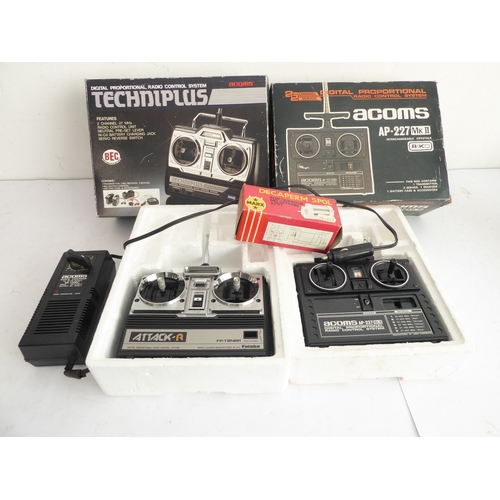 Two boxed remote controls; one digital proportional radio controlled ...