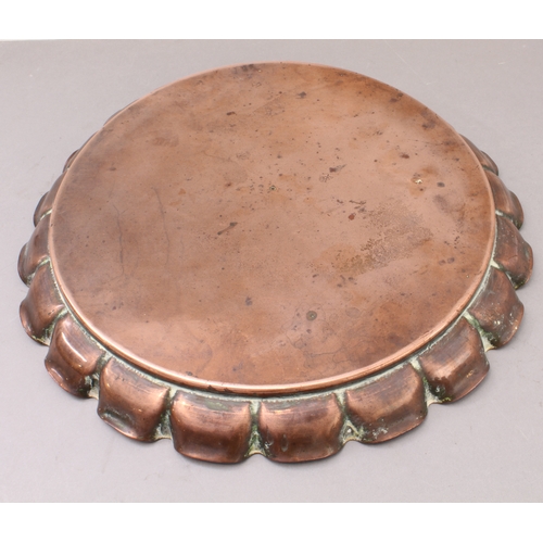 Two pieces of copperware: 1. an Arts & Crafts style and period hand ...