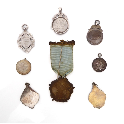 A small group of antique and vintage silver medals - including a 1907 ...