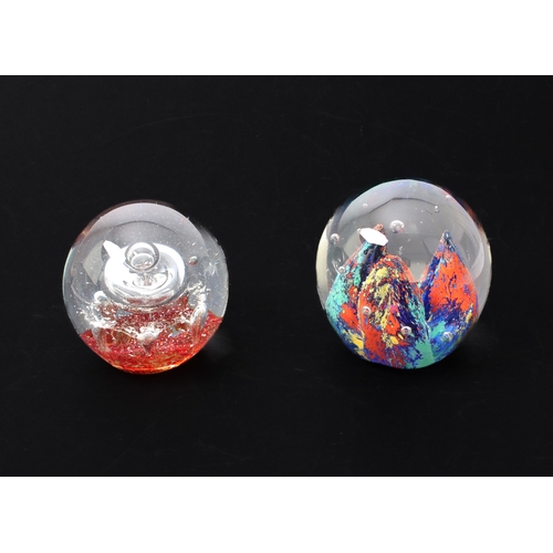 A small collection of thirteen glass paperweights - late 20th century ...