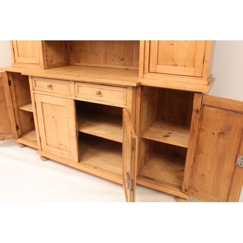 A large waxed pine breakfront kitchen dresser - the moulded cornice ...