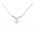 A 9ct gold and cubic zircona pendant necklace - Italian, UK hallmarked ...