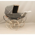 A black-painted Marmet pram (LWH140 x 62 x 120 cm)