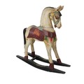 A carved and painted Miniature Model of a Carnival type Rocking Horse. (1)