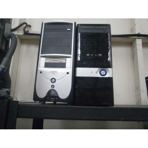 Two assorted computer towers