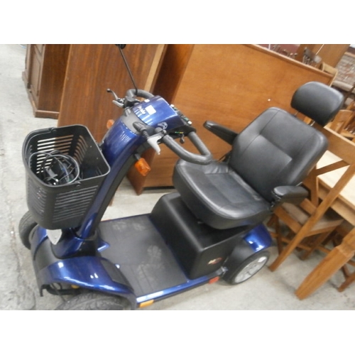 A PRIDE COLT XL8 mobility scooter with charger and key. In full working ...