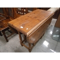 A large gate leg kitchen dining table