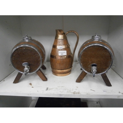 Two wooden barrels and jug