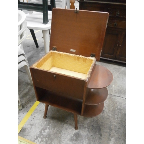 A small vintage sewing box table