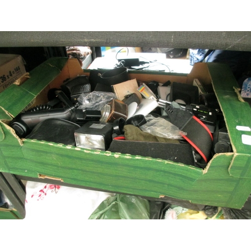Box of assorted camera accessories