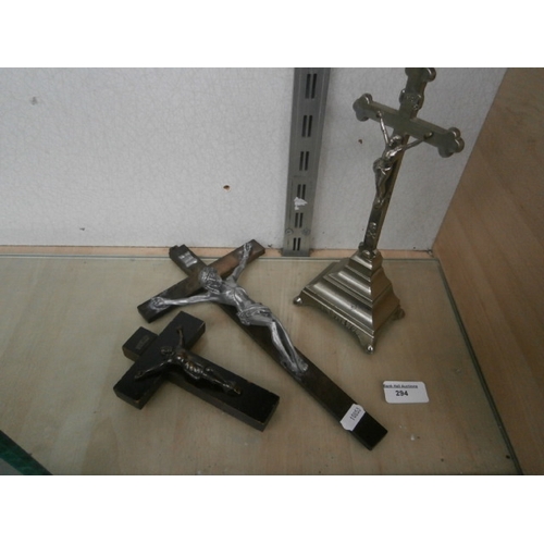 Three assorted crucifixes