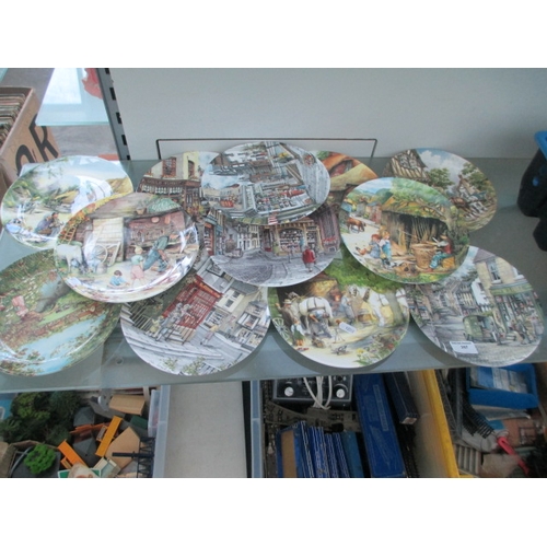 12 assorted collectable plates