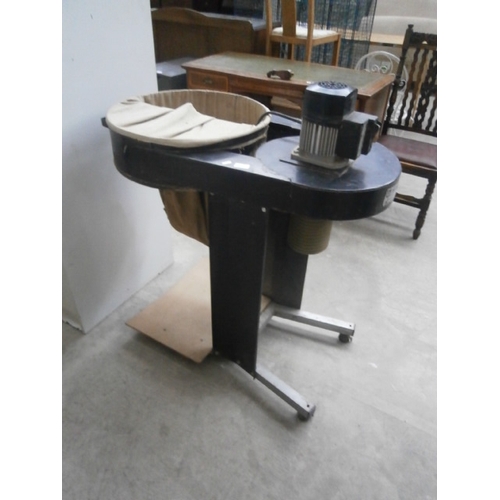 An Elu Industrial Dust Extractor unit on trolley frame powers up