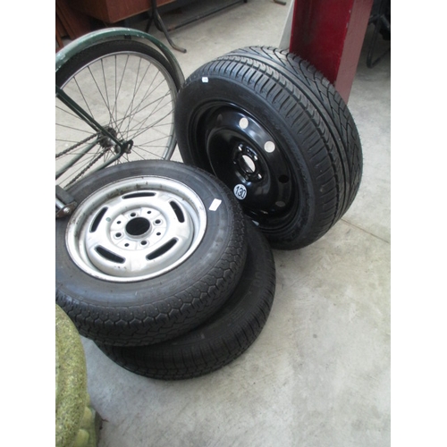 3 x assorted car tyres on rims
