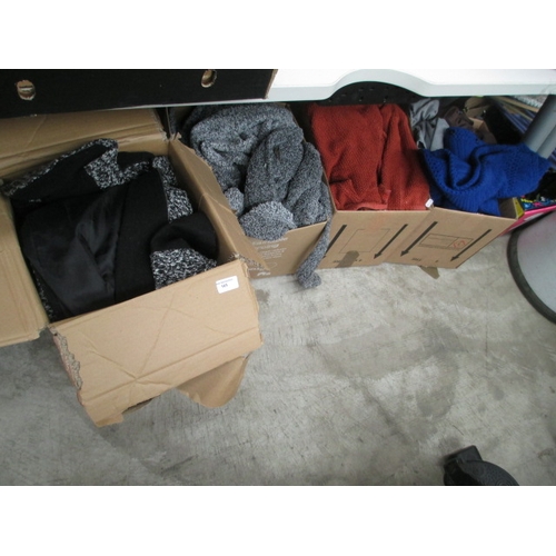 Four boxes of assorted clothing