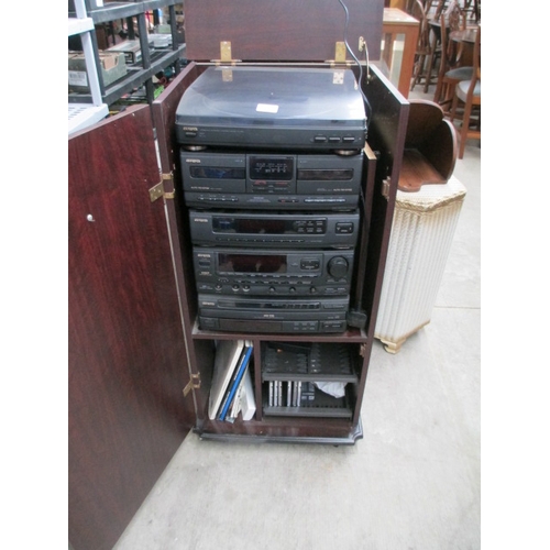 A 5 piece retro AIWA stacking stereo set in cabinet