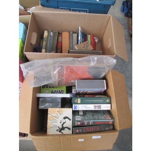 Two boxes inc Books, magazines, videos, games.