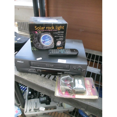Lot inc ProLine VHS player and Solar Rock light