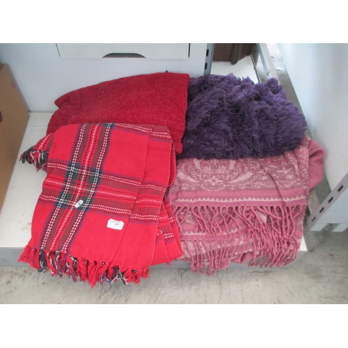 Four assorted blankets