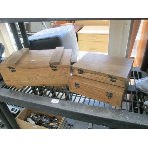 Set of three decorative wooden storage boxes