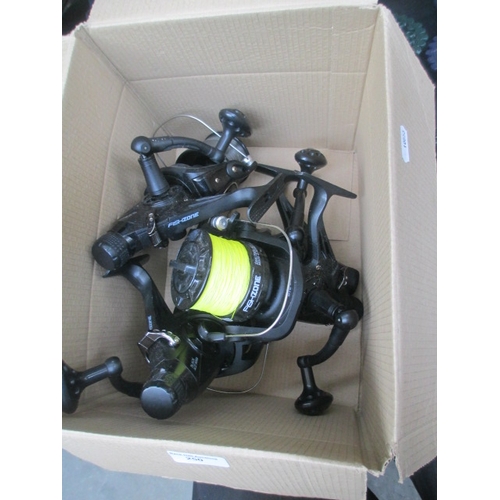Four assorted fishing reels