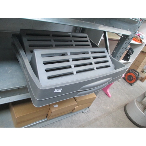 Two plastic under bed shoe racks