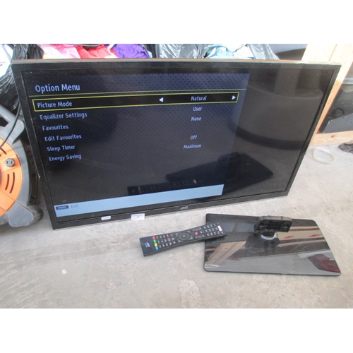 JVC 32" smart Tv with stand and remote working