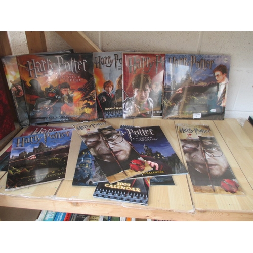 12 Harry Potter calendars, 8 still in original wrapping