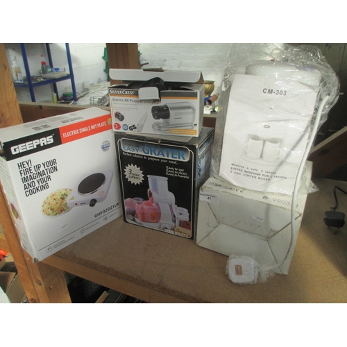 electric hot plate, knife sharpener, grater and a coffee machine.
