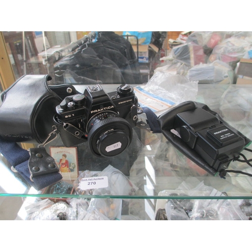 Praktika electronic BC1 camera with flash and instruction booklet