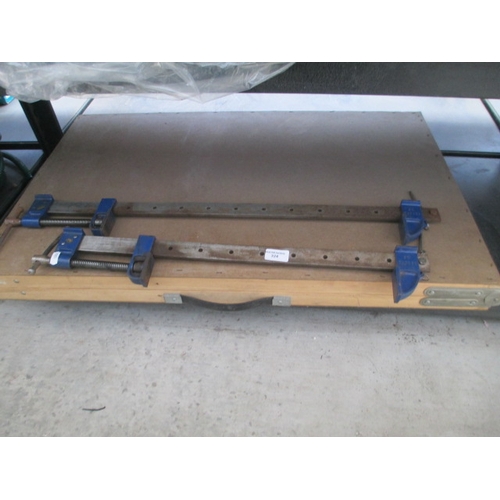 A pair of clamps & a pasting table