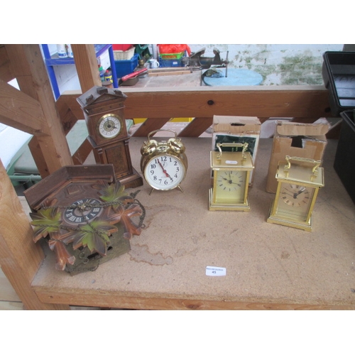 Five assorted clocks