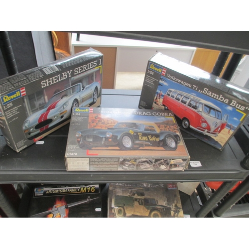 Three assorted model kits