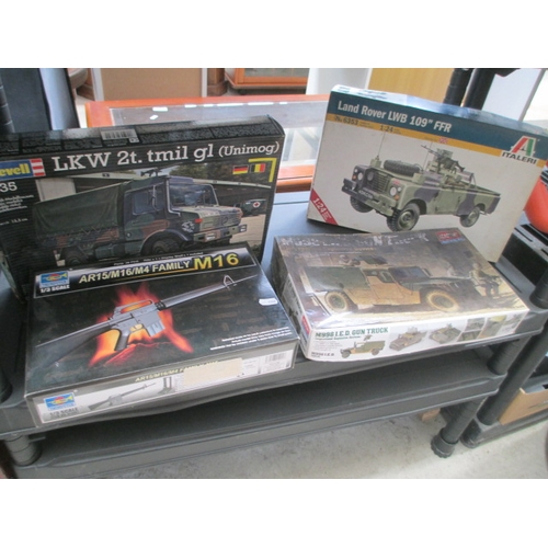 Four assorted model kits