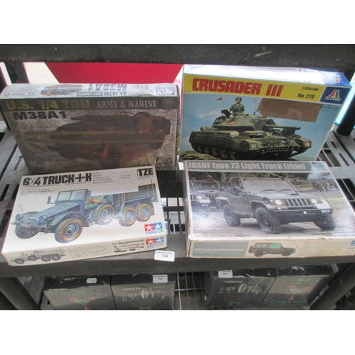 Four assorted model kits