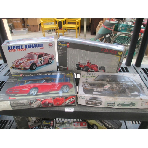 Four assorted model kits