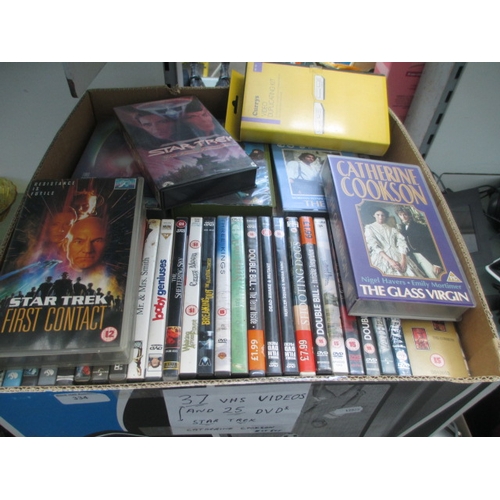 Box of 35 videos and 25 DVDs