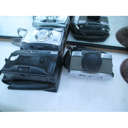 Three assorted cameras