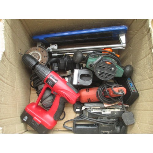 Box of assorted power tools