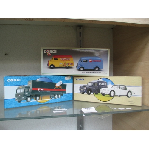 Three boxed Corgi models