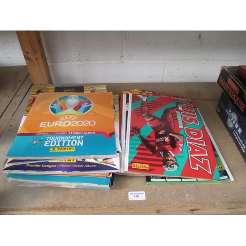 Collection of football sticker albums and stickers with football magazines