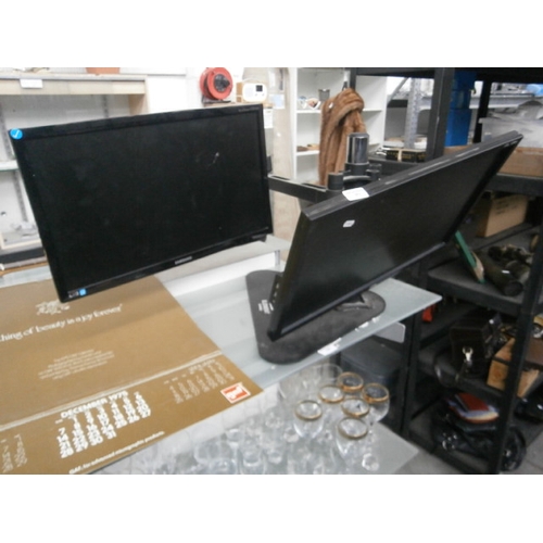 Samsung and BENQ monitors on twin mount stand