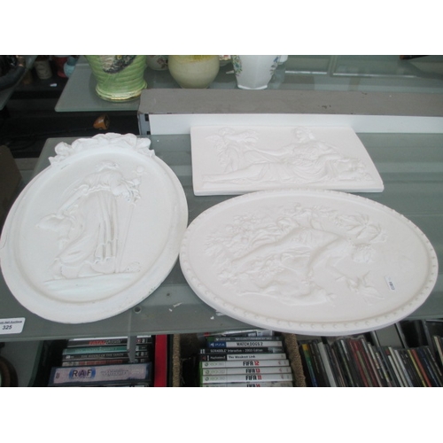 Three decorative cast plaques