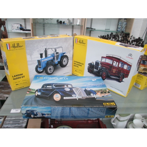 Three assorted model kits