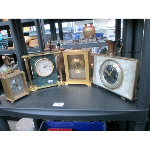 Four assorted clocks