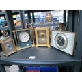 Four assorted clocks