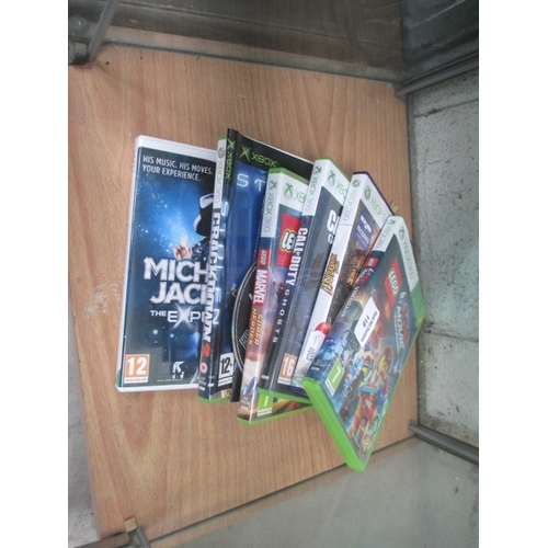 Seven assorted console games