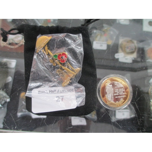 Commemorative Remember, Reflect, Respect coin and Never Forget badge